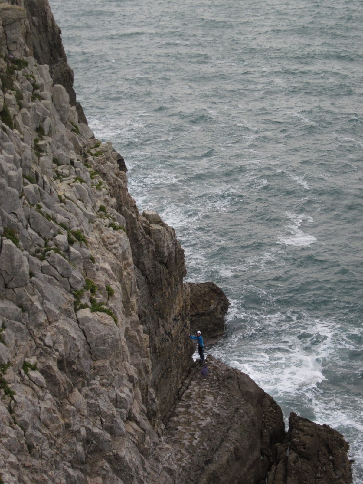 Rock climbing over the ocean | Katrina Megget